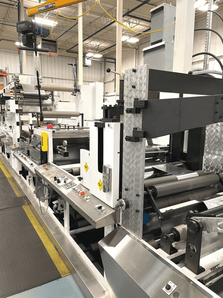 Adhesive Coating Capabilities - Custom Hot Melt Adhesive | Plitek