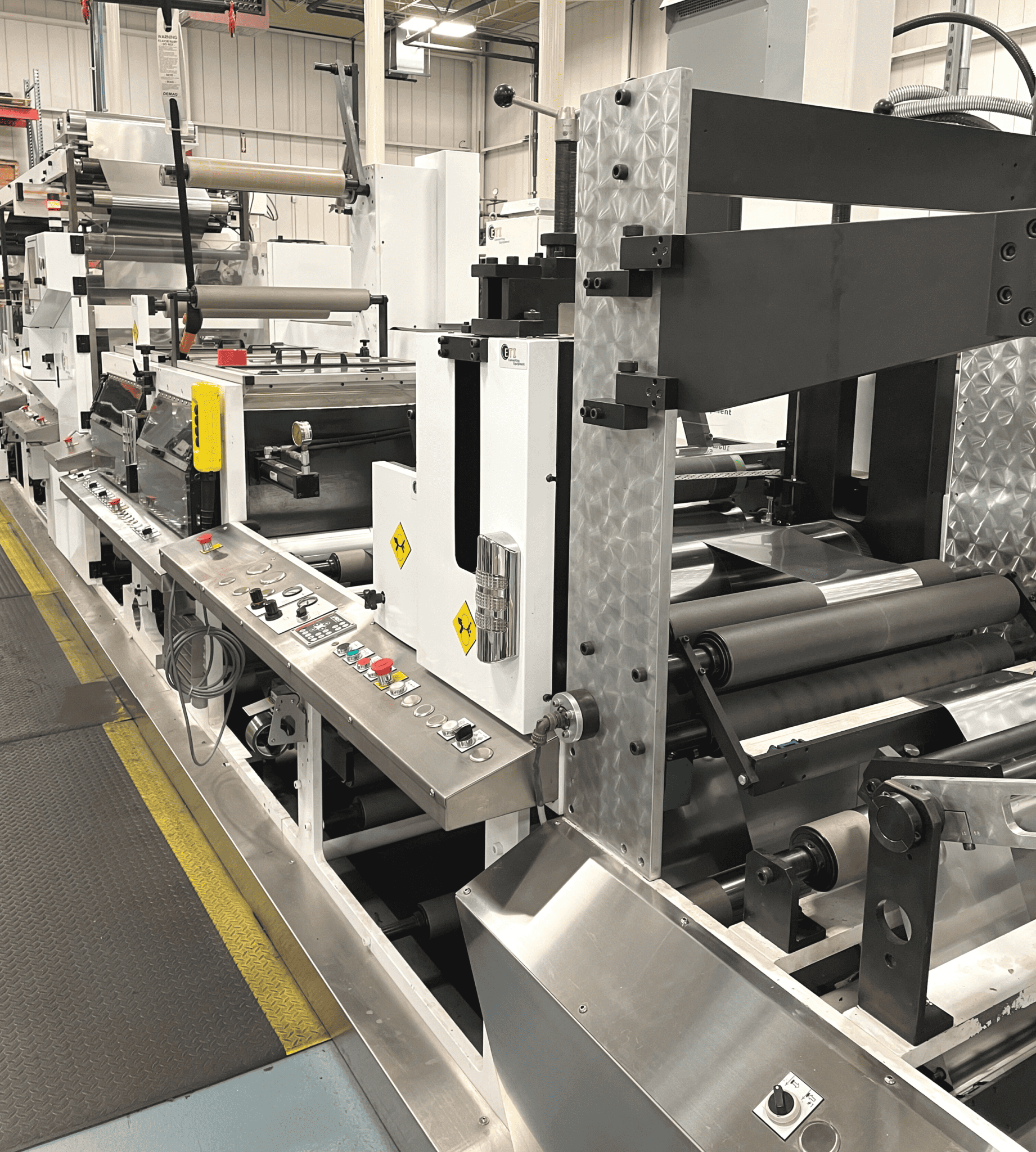 Adhesive Coating Capabilities - Custom Hot Melt Adhesive | Plitek